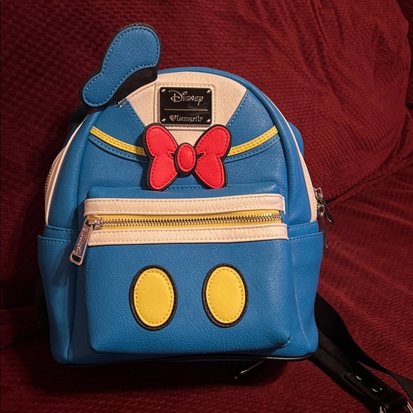 Loungefly | Bags | Disney Loungefly Blue And Yellow Backpack With Red ...
